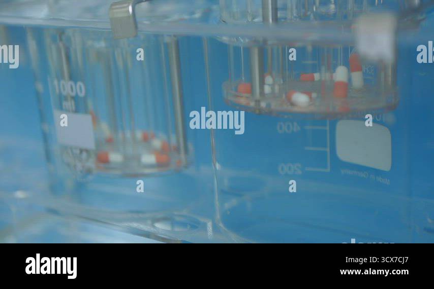 Pill Dissolving in Liquid Stock Video Footage - Alamy