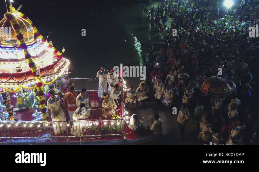 Thousand attend the floating chariot festival at beach Stock Video ...