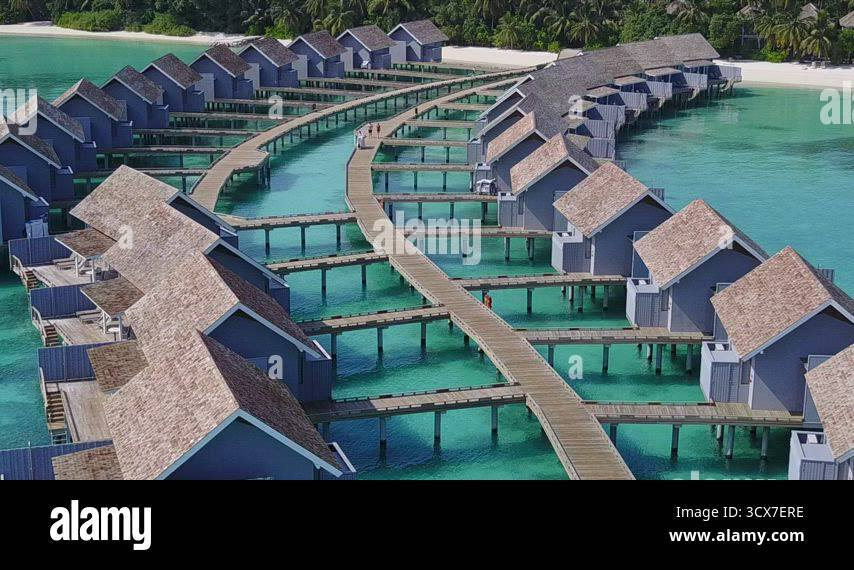 Aerial drone travel of perfect shore beach break by blue sea with clean ...