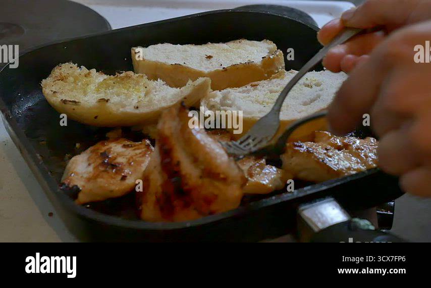 frying meat in a pan slow motion Stock Video Footage - Alamy