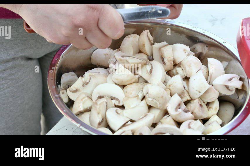 Chopping mushrooms 4k Stock Video Footage - Alamy