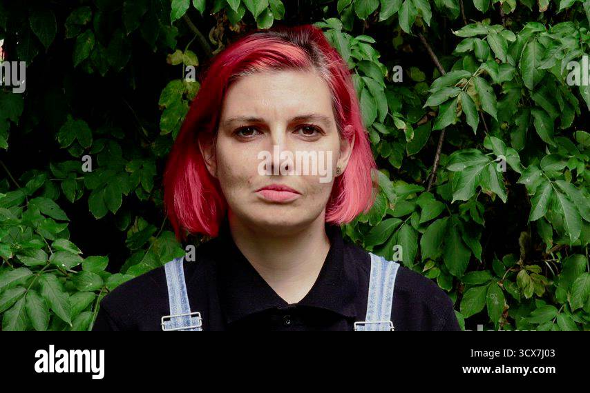 Young woman taking poses and modeling Stock Video Footage - Alamy