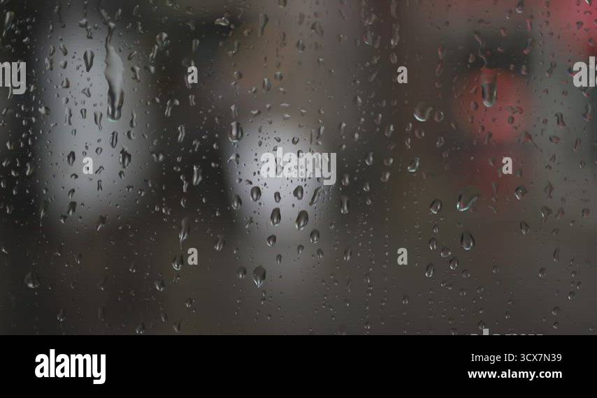 Looking at the Rainy Day Outside Through a Window with Raindrops Stock ...