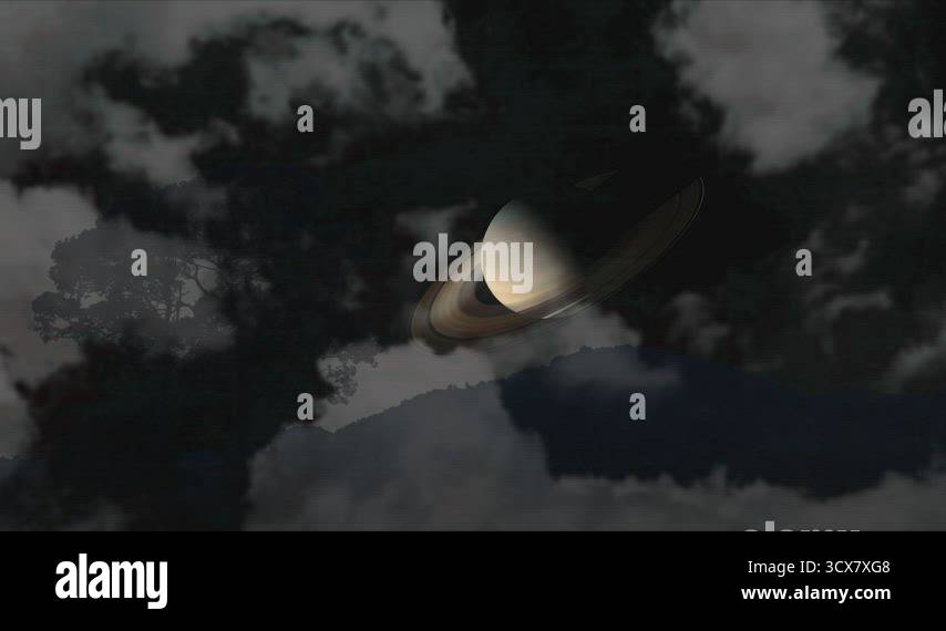 Saturn rise back silhouette mountain and tree with dark cloud on the ...