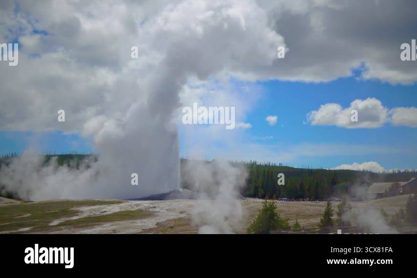 Geyser Old Faithful erupts in Yellowstone National Park in Wyoming, USA ...