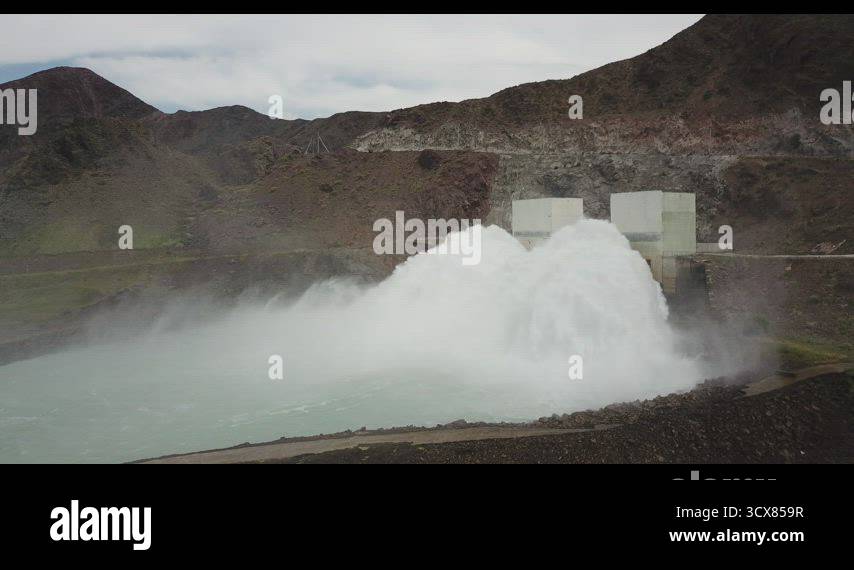 Dam with large discharge pressure of the water Stock Video Footage - Alamy