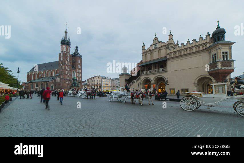 Krakow market square day to night time lapse Stock Video Footage - Alamy
