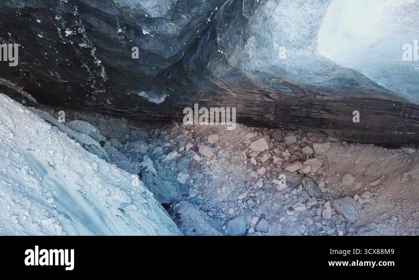 Ice cave in the snowy mountains. Tuyuk-Su glacier Stock Video Footage ...