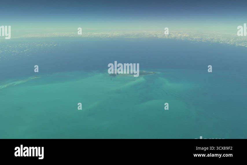 Flying over The Bahamas. Beautiful ocean colors. Actual aerial footage ...