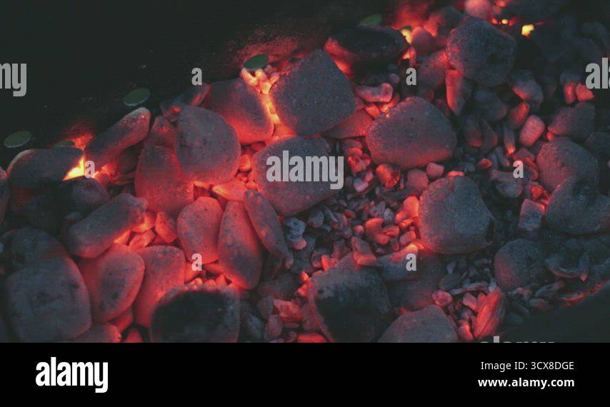 Red Hot Smolder Coals in Barbecue Grill Stock Video Footage - Alamy