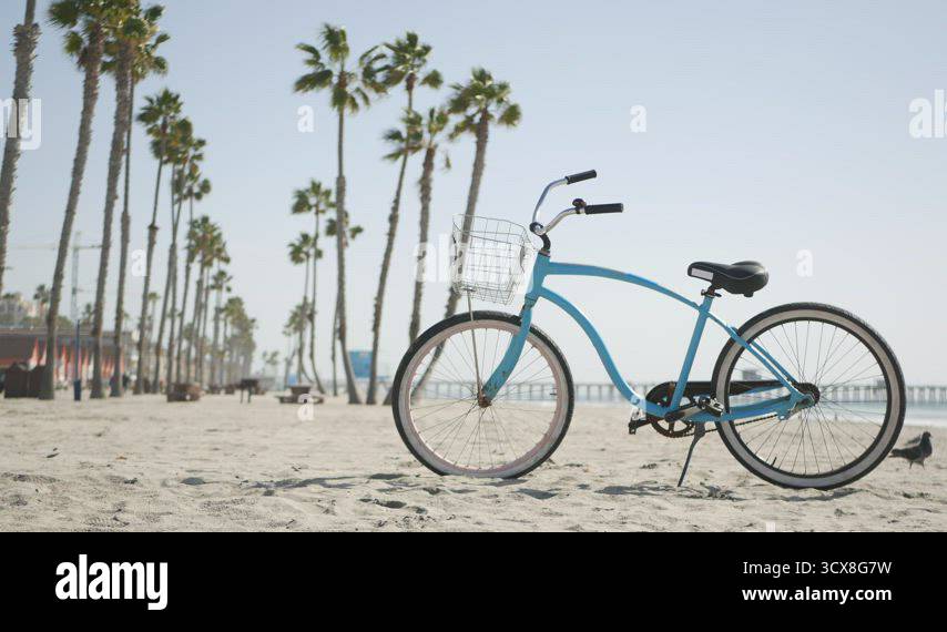 Bicycle cruiser bike by ocean beach, California coast USA. Summer cycle ...