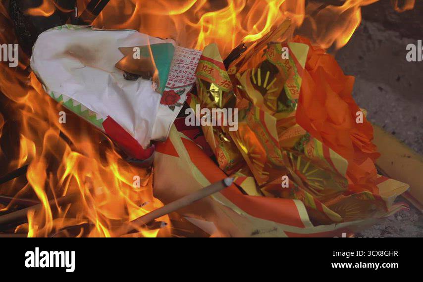 Slow motion burning joss paper at furnace at chinese temple Stock Video ...