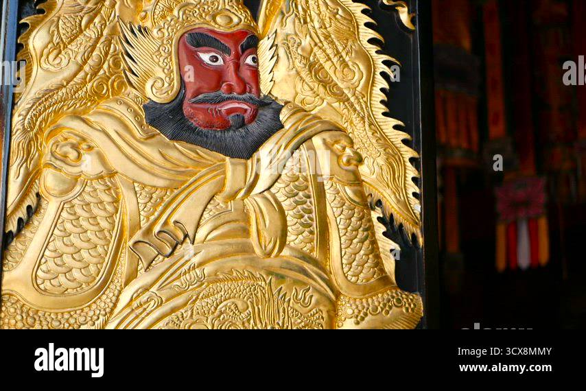Wooden gates decorated with traditional chinese ancient holy door gods ...