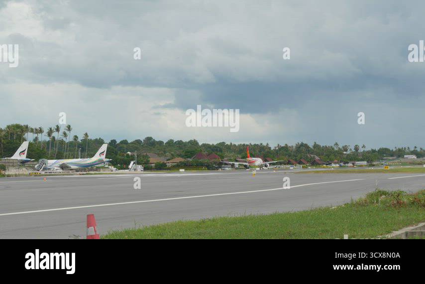 KOH SAMUI ISLAND, THAILAND - 23 JUNE 2019: White airplanes flying and ...