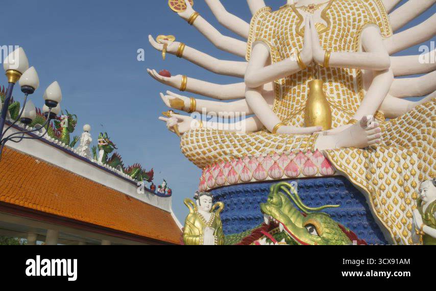 Statue of Guanyin in yard of Buddhism temple. Statue of Guan Yin with ...