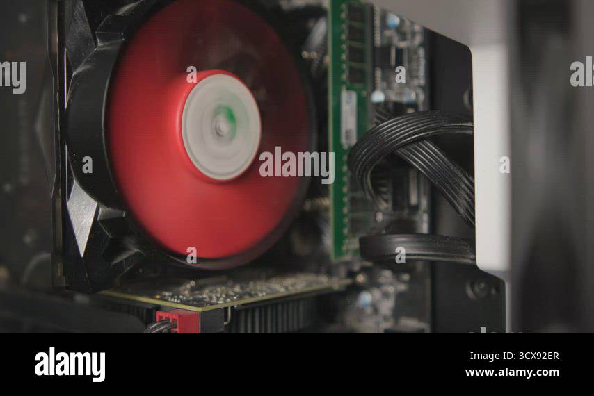 The Red Cpu Cooler On The Motherboard Is Spinning. Computer Cases ...