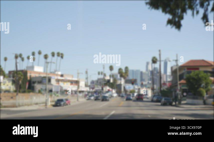 Driving on downtown streets of Los Angeles, California USA. Defocused ...