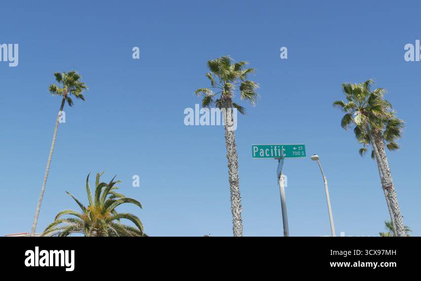 Pacific street road sign on crossroad, route 101 tourist destination ...