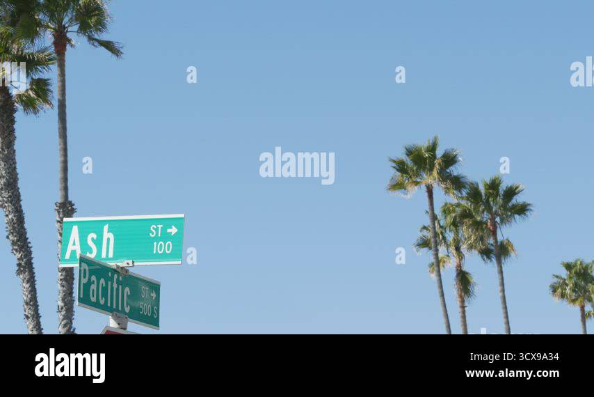 Pacific street road sign on crossroad, route 101 tourist destination ...