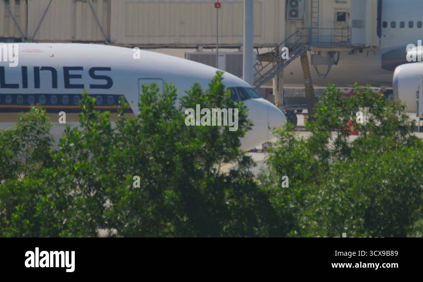 Boeing 777 taxiing after landing Stock Video Footage - Alamy
