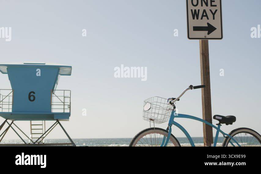 Bicycle cruiser bike by ocean beach, California coast USA. Summer cycle ...