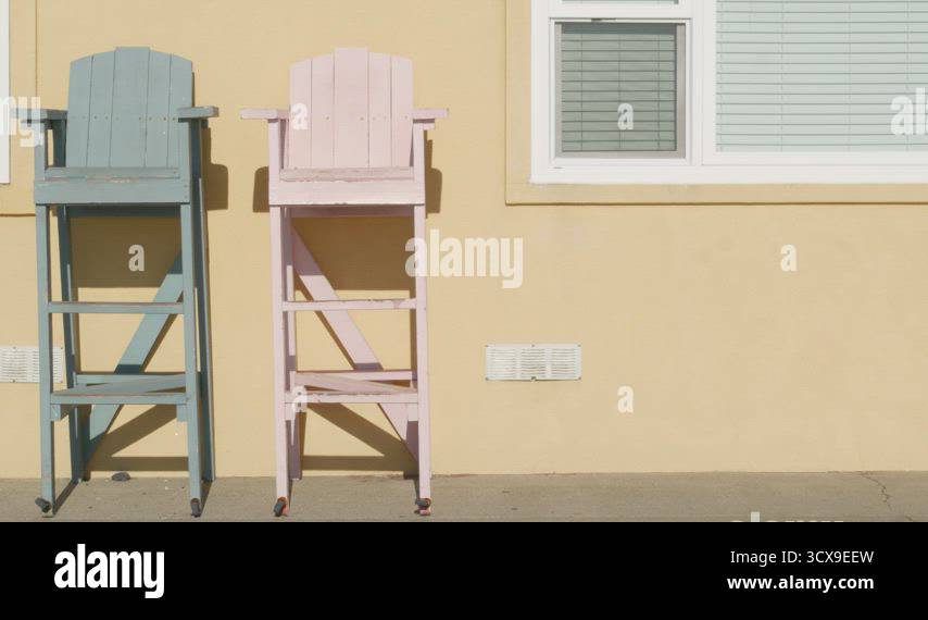 Lifeguard chairs in California USA. Life guard high seat by ocean sea ...