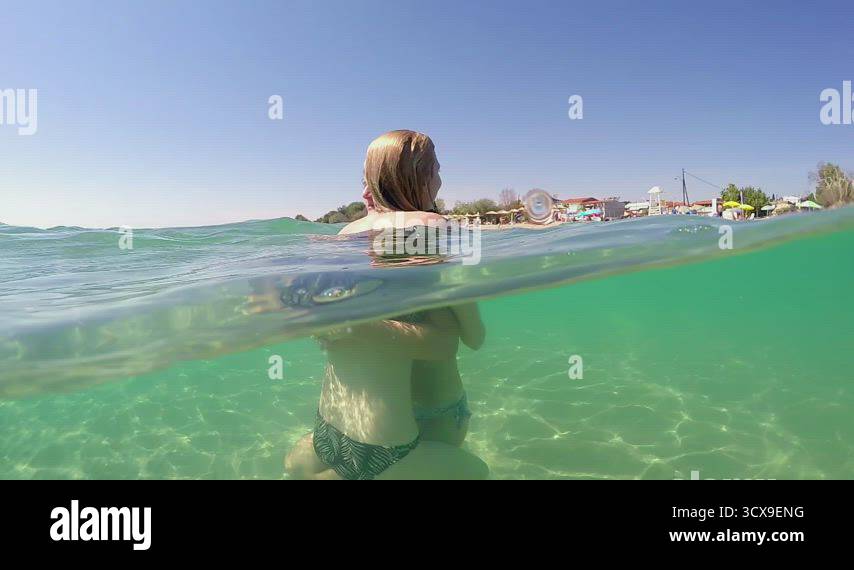 Best friends hugging. Two cute girl teenagers giving kiss and hug on ...