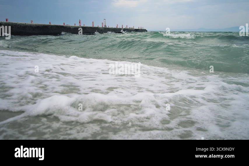 Magic seascape storm waves pier. Morning on the coast. Beautiful ...