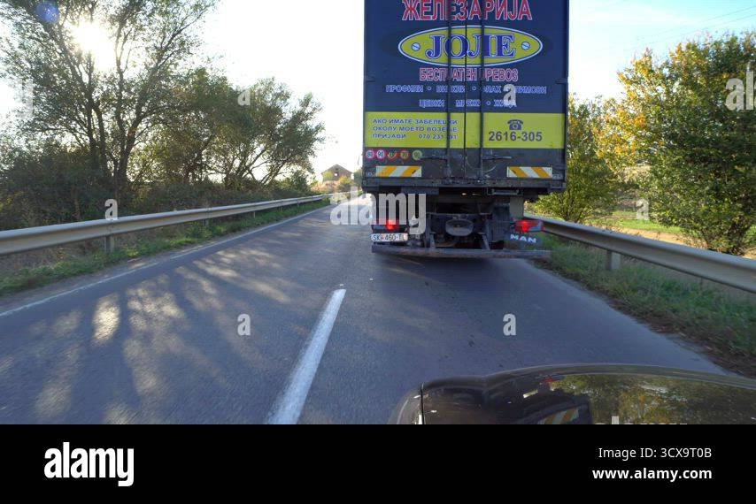 Cars overtake slow moving trucks Stock Videos & Footage - HD and 4K ...