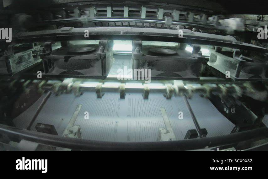 Offset sheetfed printing press production line with machine parts ...