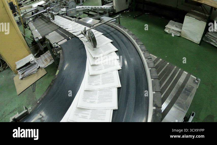 Breaking news out of a newspaper offset printing paper roll Stock Video ...