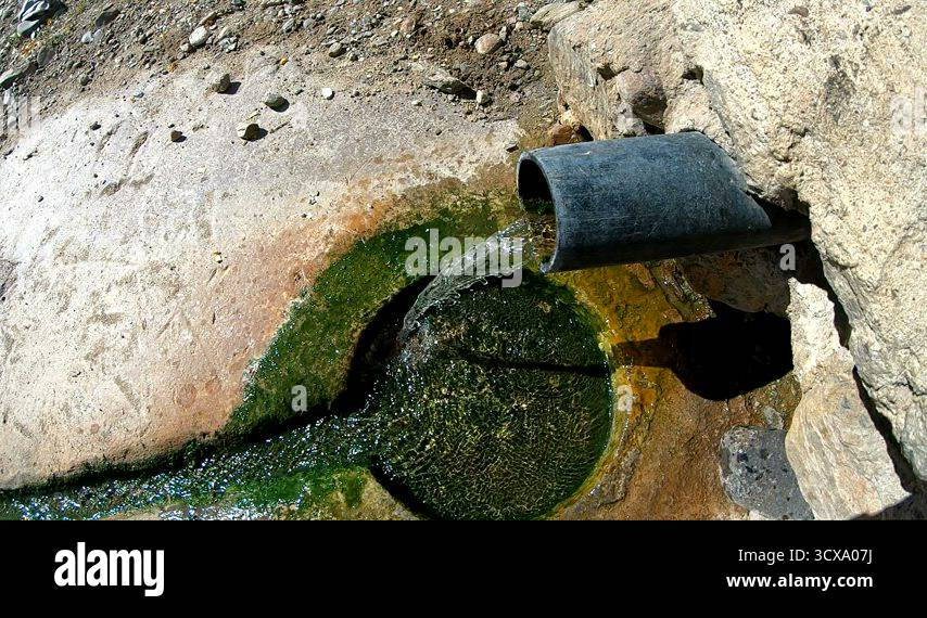 Fresh mineral water from a fresh water source. Small natural spring ...