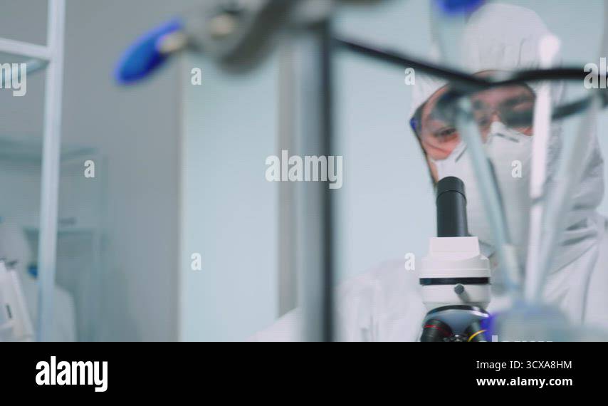 Biochemist in ppe suit looking Stock Videos & Footage - HD and 4K Video ...