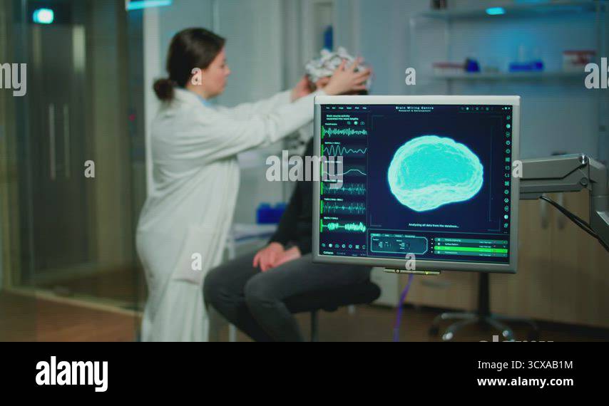 Medical researcher preparing patient for examining brain functions ...