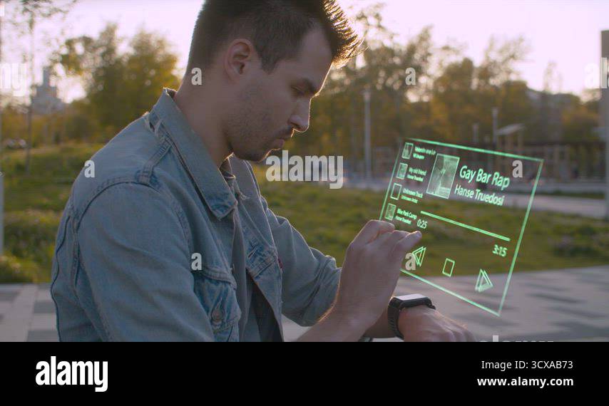 Man in the city park using futuristic device Stock Video Footage - Alamy