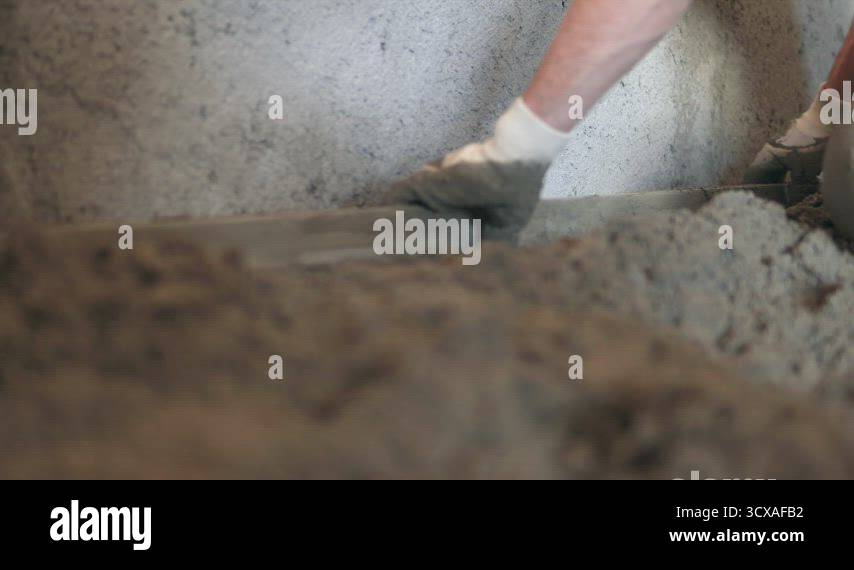 Construction worker troweling wet concrete Stock Videos & Footage - HD ...
