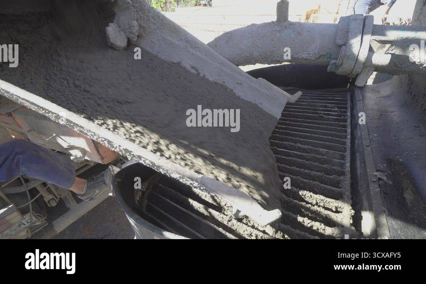 Concrete Truck Chute Pouring Wet Cement Mix into Crane Pump Stock Video ...