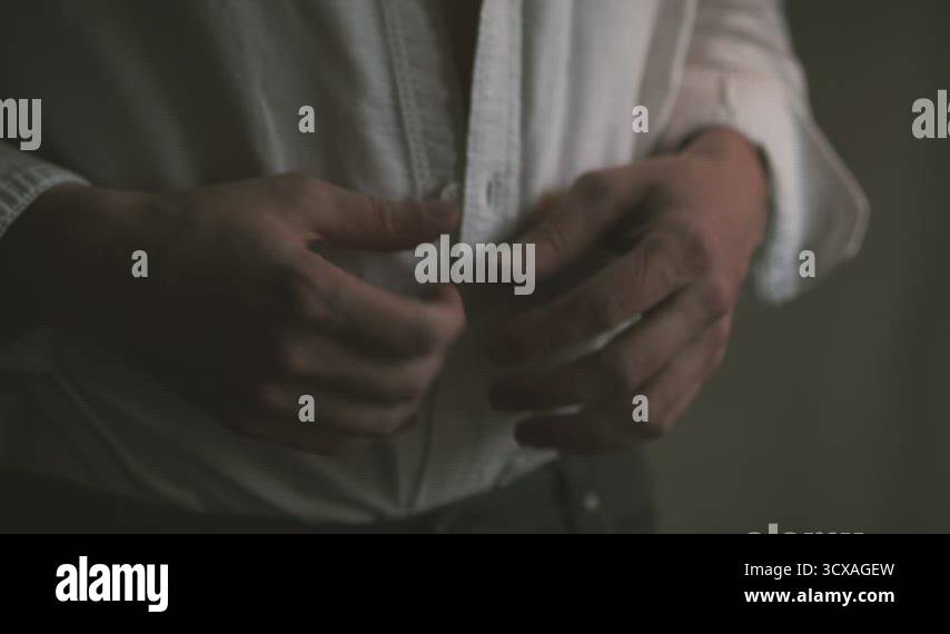 Buttoning up shirt Stock Videos & Footage - HD and 4K Video Clips - Alamy