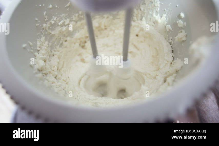 Electric hand mixer with the dough for the pie Stock Video Footage - Alamy