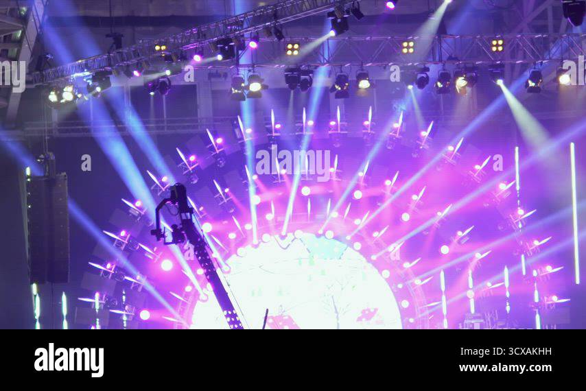 Crane jib camera moves in front of stage lights Stock Video Footage - Alamy