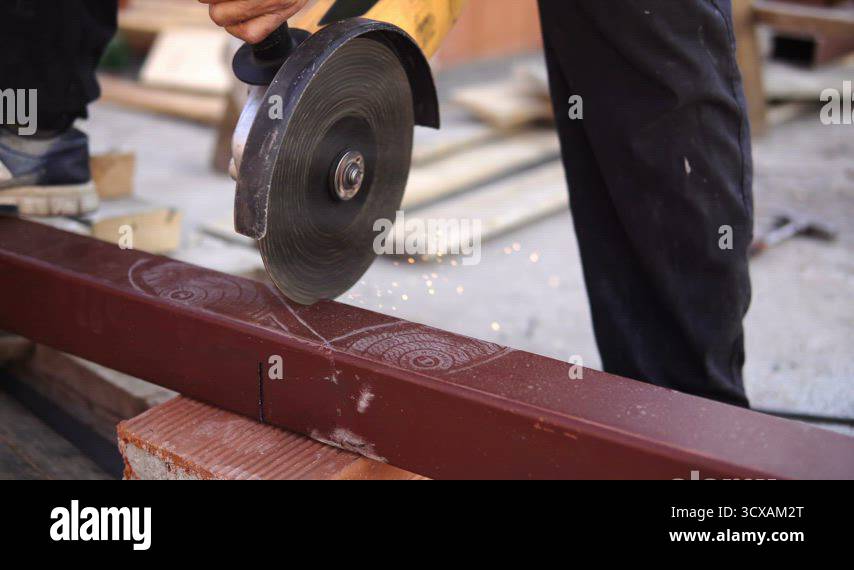 Worker Cutting Metal With Grinder Stock Video Footage - Alamy