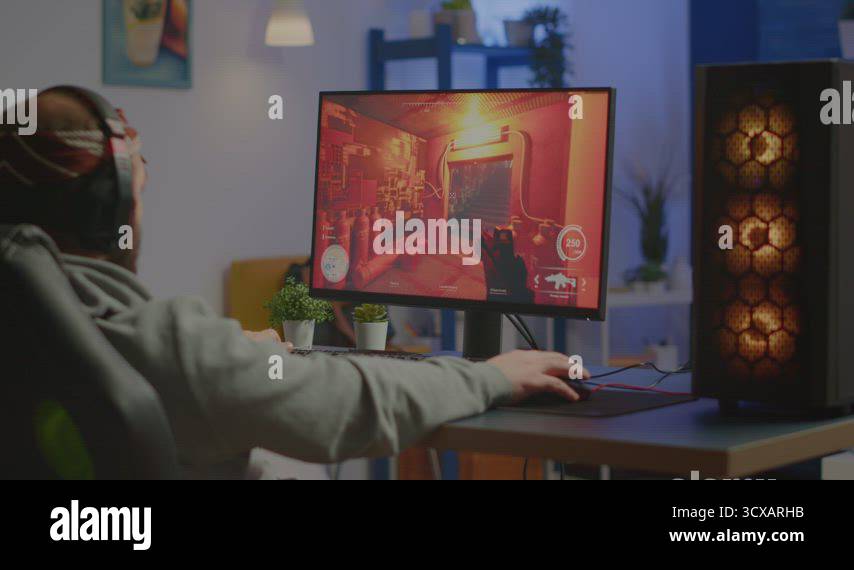 Game over for sad gamer playing shooter video games on powerful ...