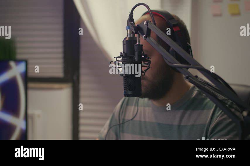 Close-up of streamer man talking into microphone Stock Video Footage ...