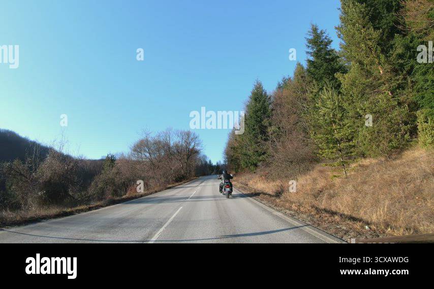 Motorcycle driver riding alone Stock Videos & Footage - HD and 4K Video ...