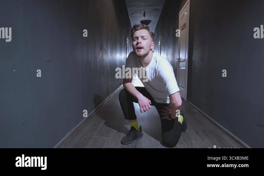 Young cool man contemporary hip hop dancer performs his dance on camera ...