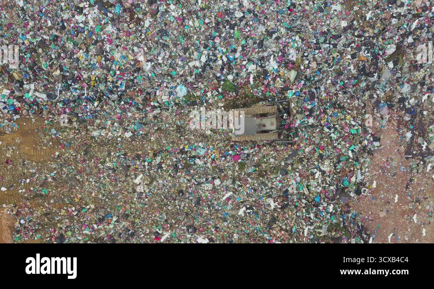 Bulldozer pushing trash Stock Video Footage - Alamy