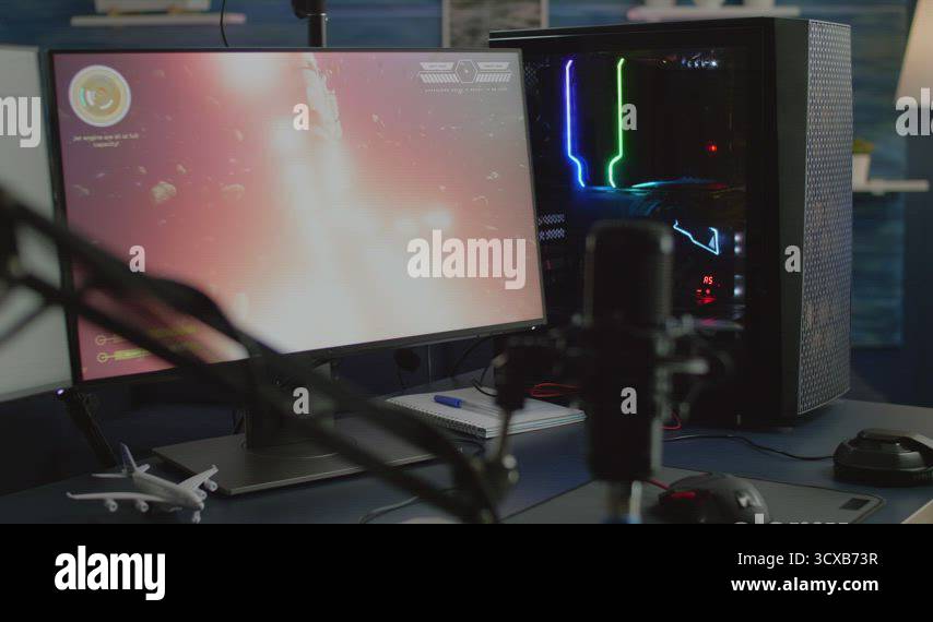 Game is loading on display of RGB professional powerful computer Stock ...