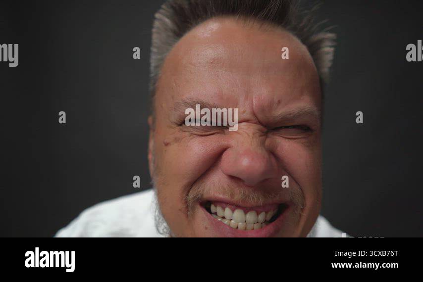 Close up angry or aggressive man shouting out loud with ferocious ...