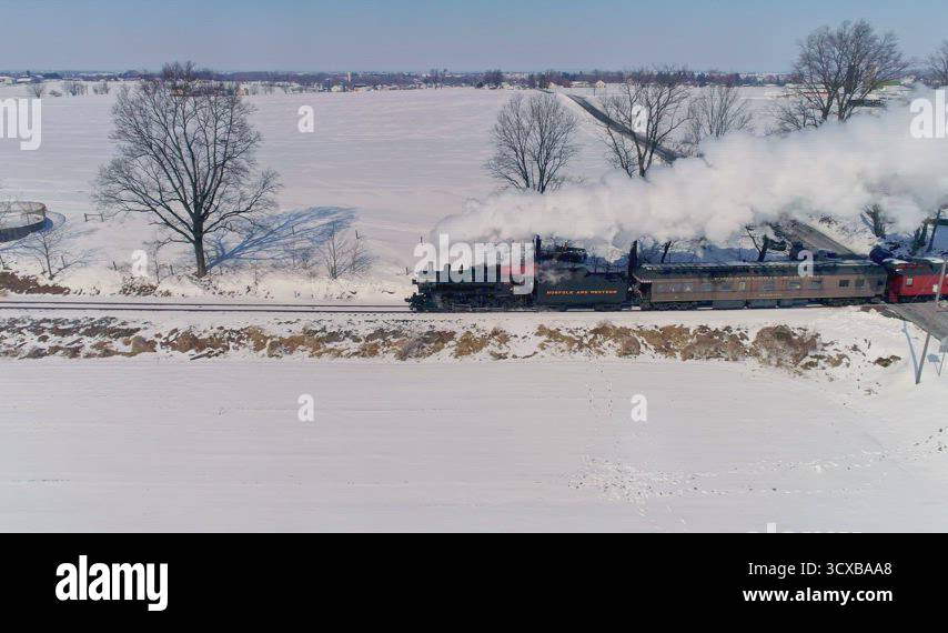 Aerial View of an Antique Steam Locomotive Approaching Pulling ...