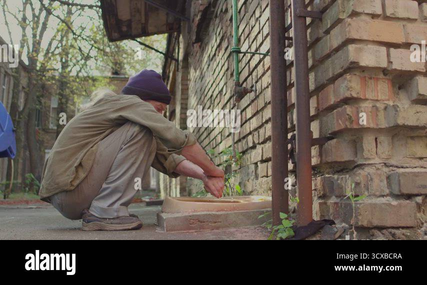 Side view homeless man washing Stock Videos & Footage - HD and 4K Video ...